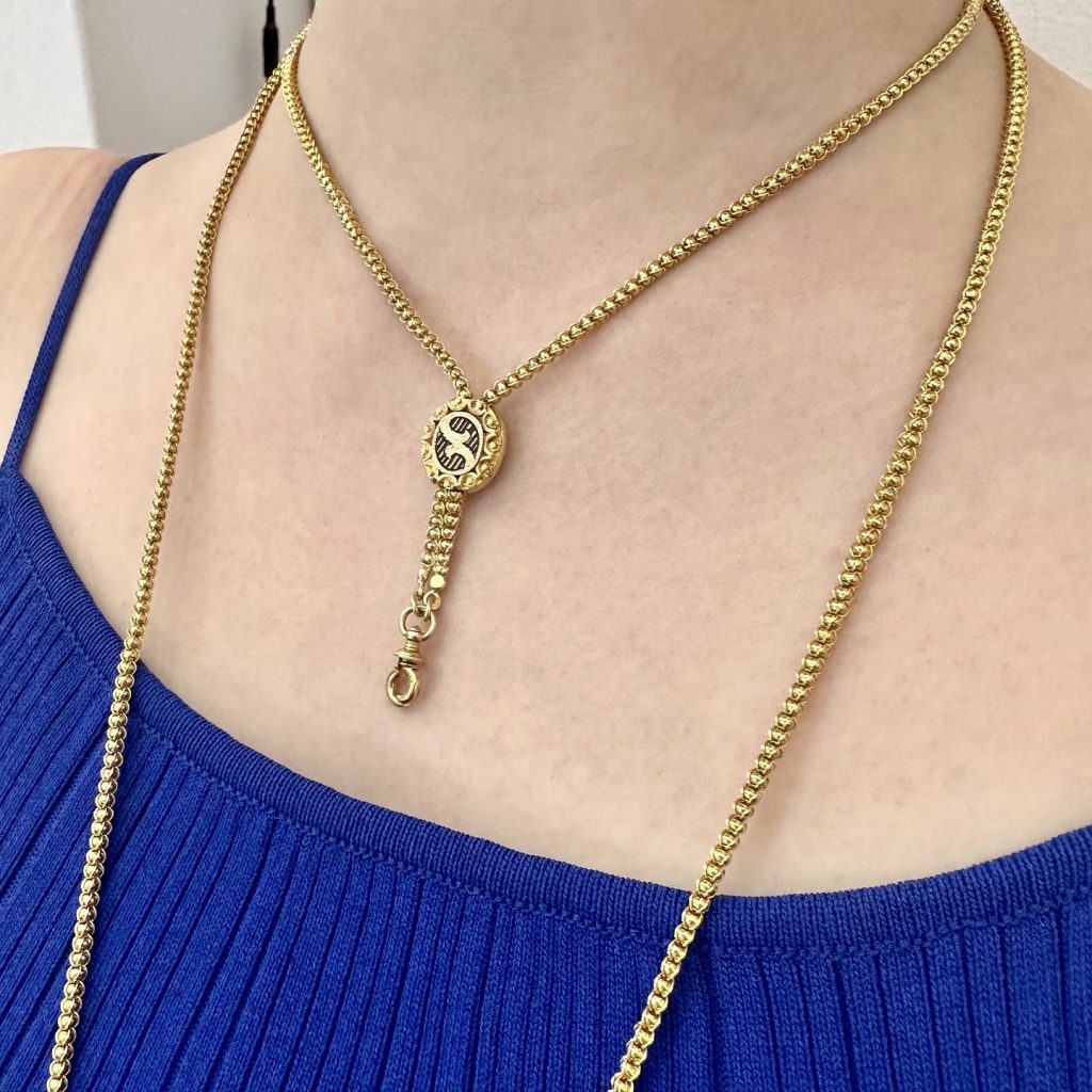 SOLD: Eighteen-carat gold guard chain with pearl slide, late 19th ...